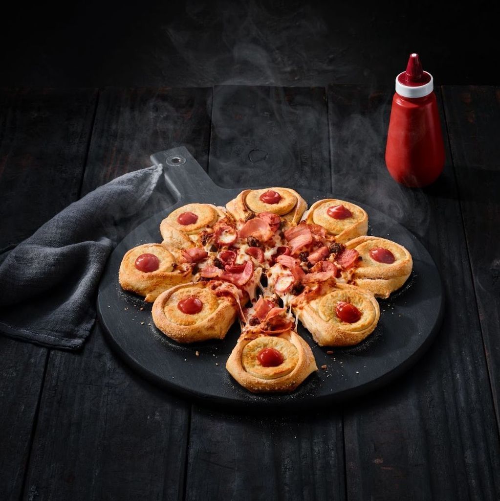 Domino's and Four'N Twenty team up for AFL season with meat pie crust ...